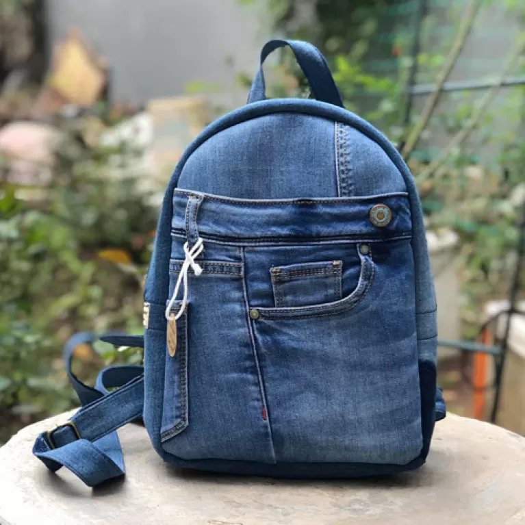 denim backpack designer