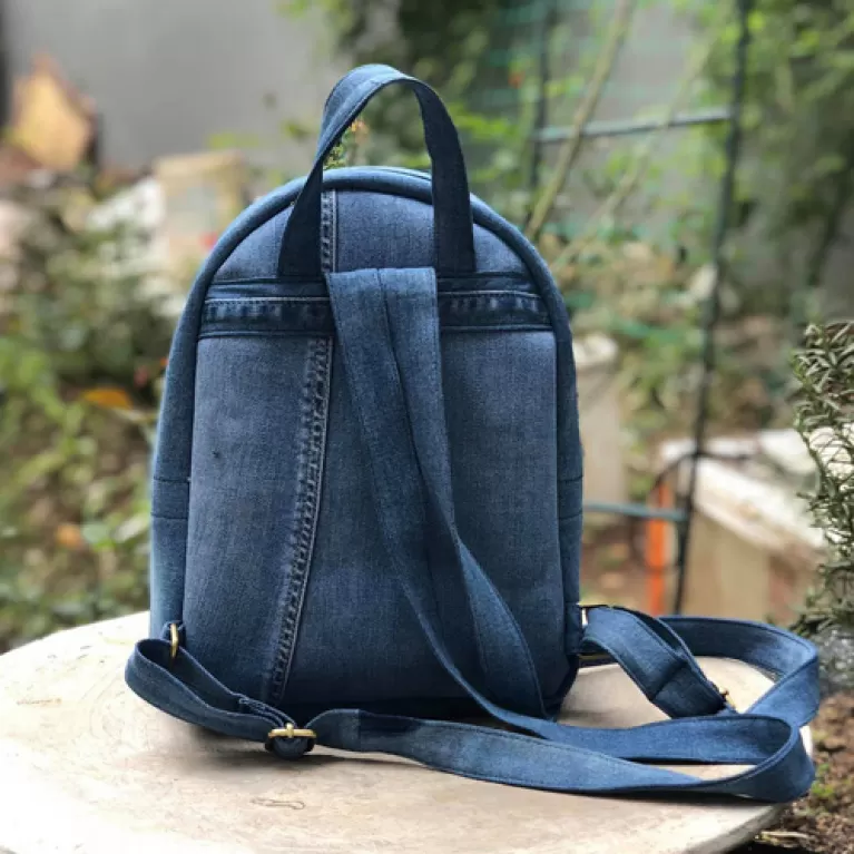 denim backpack designer